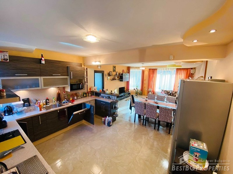 Two new houses sharing a common plot of land within close vicinity to ...